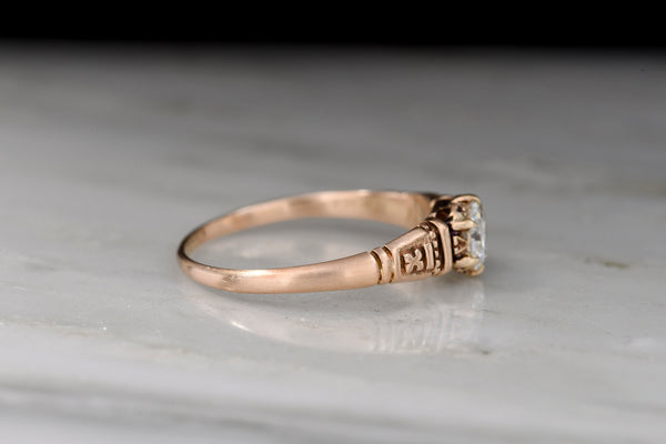 c. 1890s Solitaire Engagement Ring with Ornamented Shoulders and a Tra ...